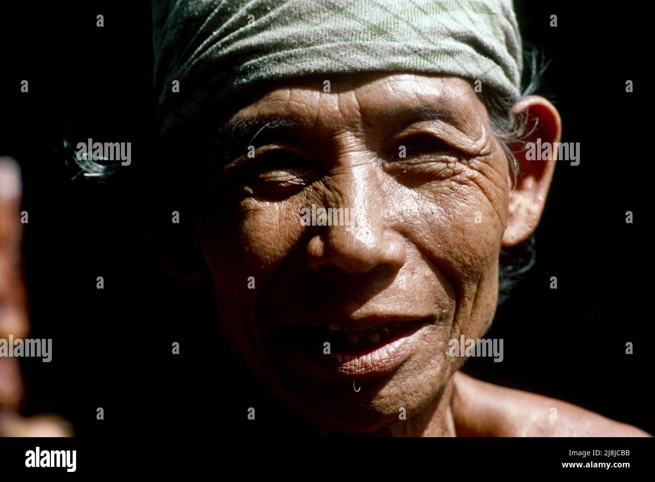 Old man from mountain tribe in central Bali, Indonesia 1984 Stock Photo ...