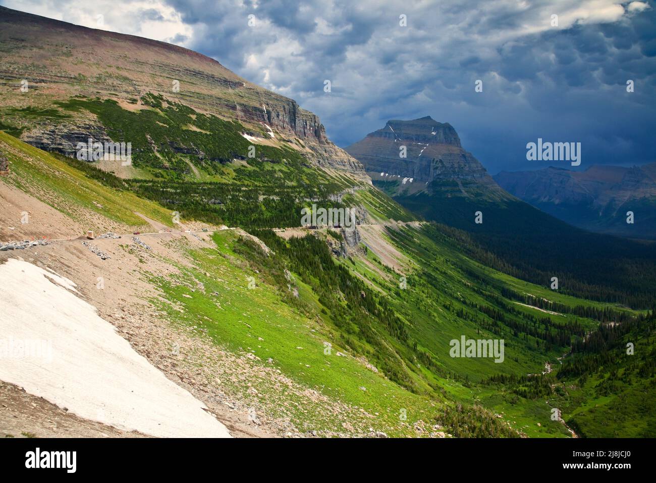 The Going-to-the-Sun road traversing the mountain slopes on the east ...