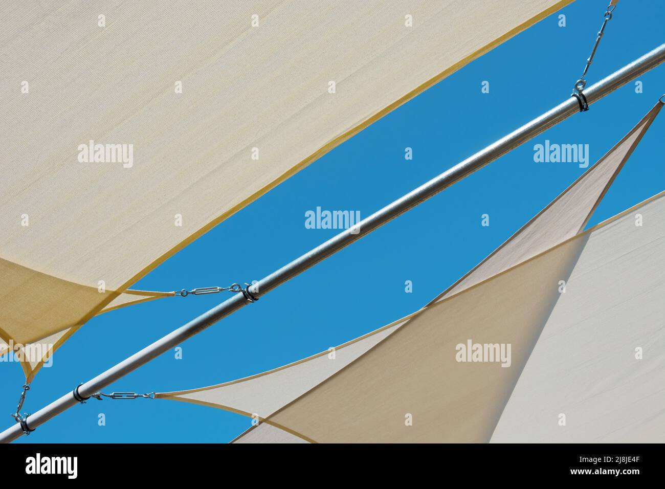 Sun sails on the beach Stock Photo - Alamy