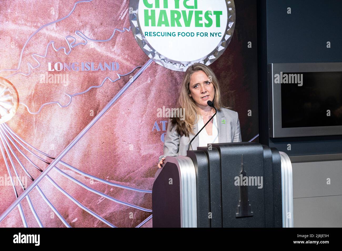 New York, NY - May 16, 2022: City Harvest COO Jen McLean speaks as chef ...