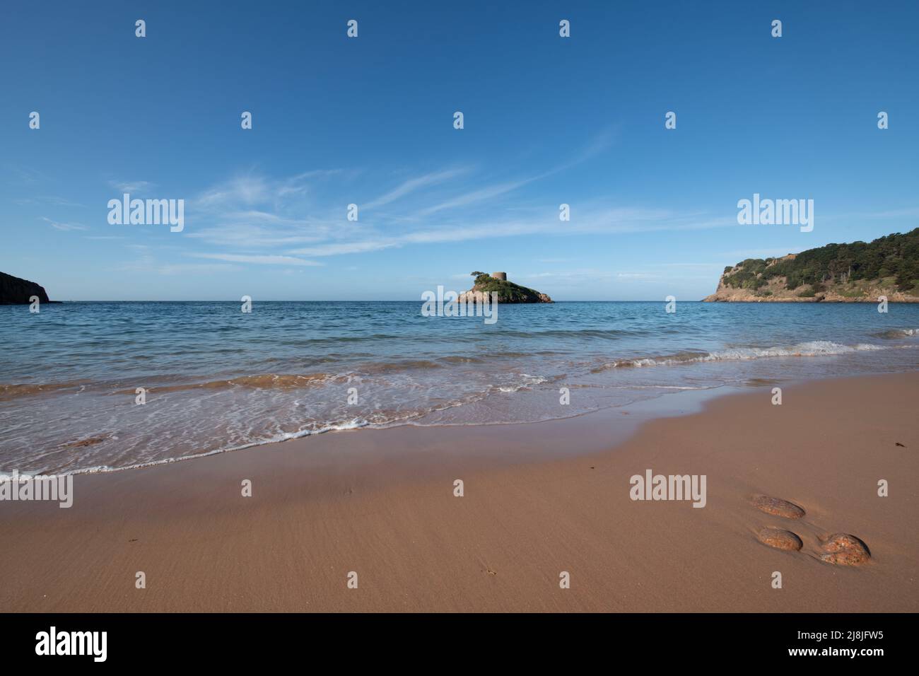 Portelet Bay at high tide, Tower, Janvrin's Tomb, Jersey, Channel ...