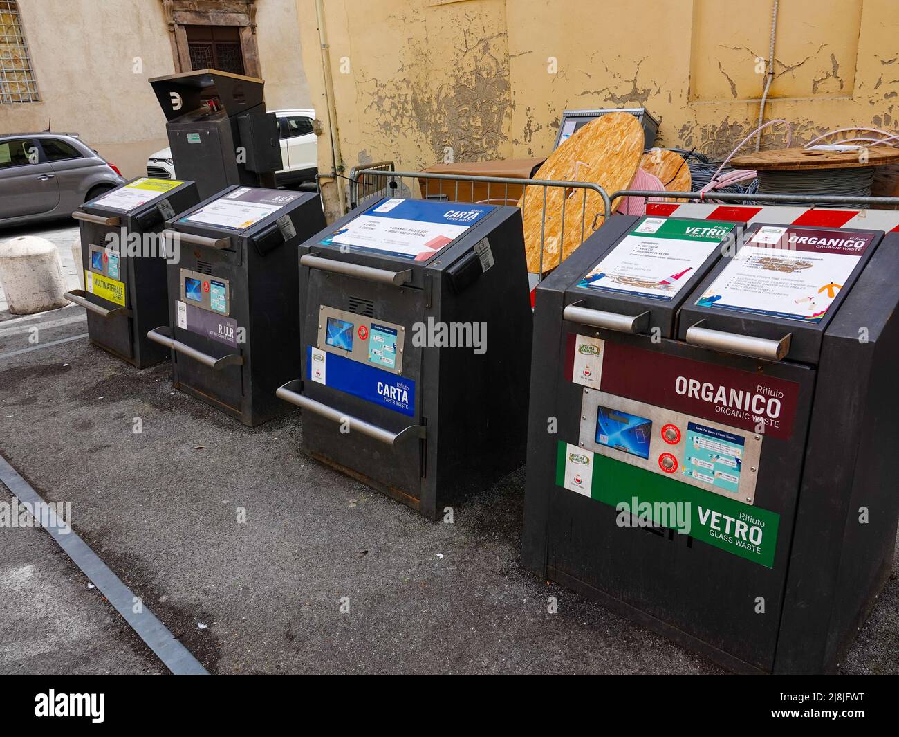 Municipal waste bins in garbage collection system, Lucca, Italy Stock ...