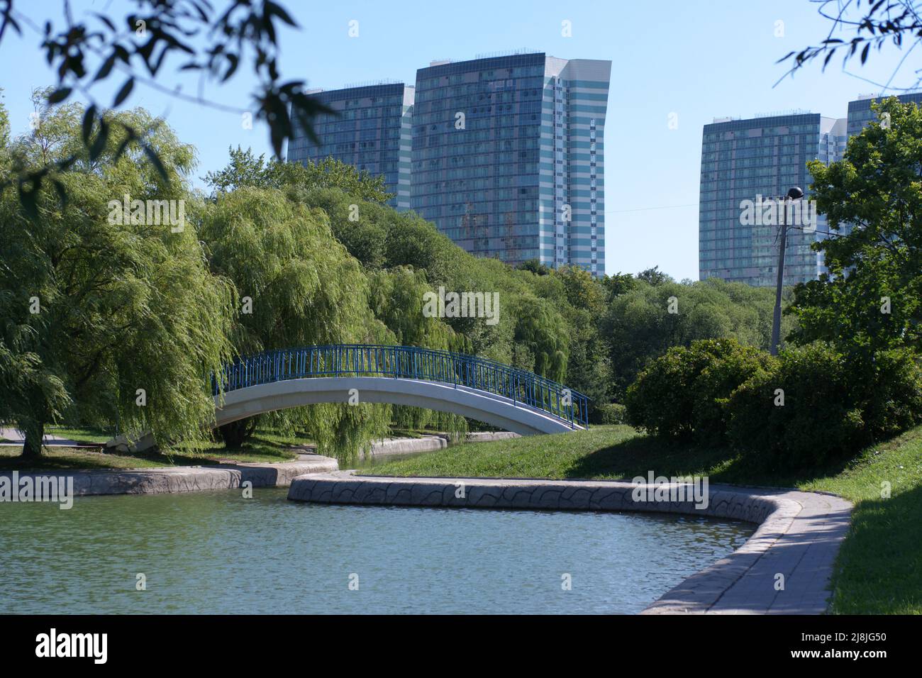 bridge over pond in park at dry sunny summer day Stock Photo - Alamy
