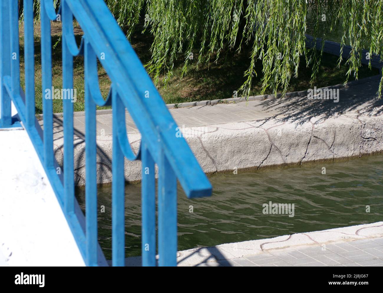 bridge over pond in park at dry sunny summer day Stock Photo - Alamy