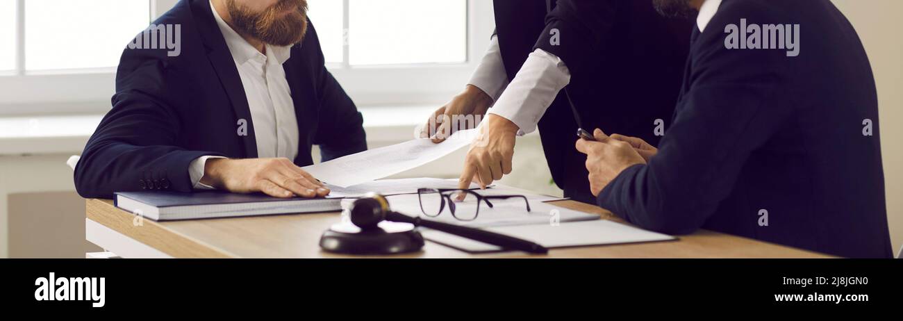 Lawyer giving a consultation to a client, providing legal advice and ...