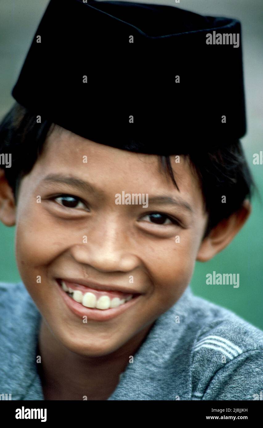 Smiling young boy in Surabaya on Java island in Indonesia 1985 Stock ...