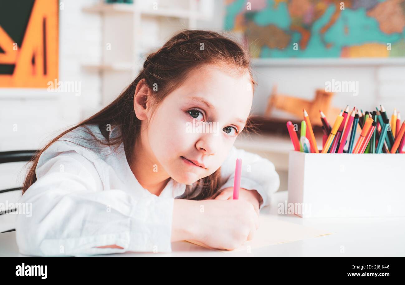 Elementary school and education. Pupil of primary school study indoors ...