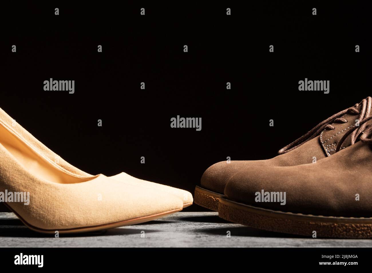 Women's and men's shoes opposite each other. The concept of ...