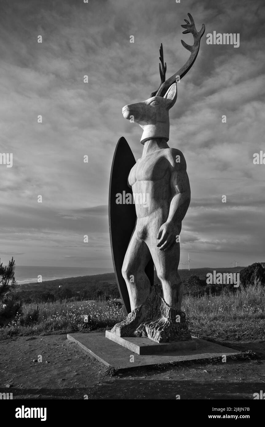 The Surfer Deer Statue in Nazare. Place of the World Guinness Record of ...