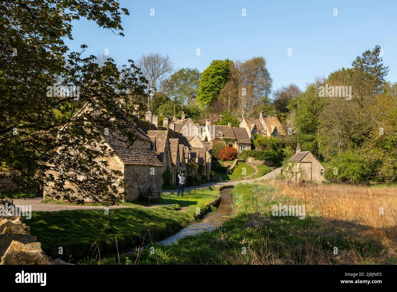 Tourist taking a photo of Arlington Row Cottages, a photogenic spot in ...