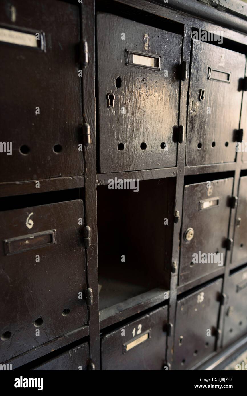 Many wooden post boxes in old apartment building Stock Photo - Alamy