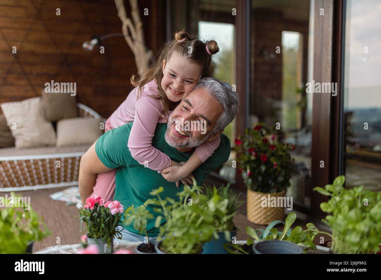 Portrait of little cute daughter hugging her happy father at home Stock ...
