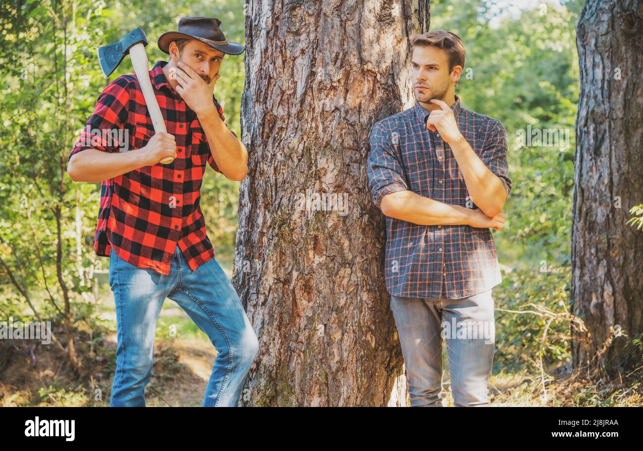 Woodcutters lumberjacks. Hipsters men on serious face with axe ...