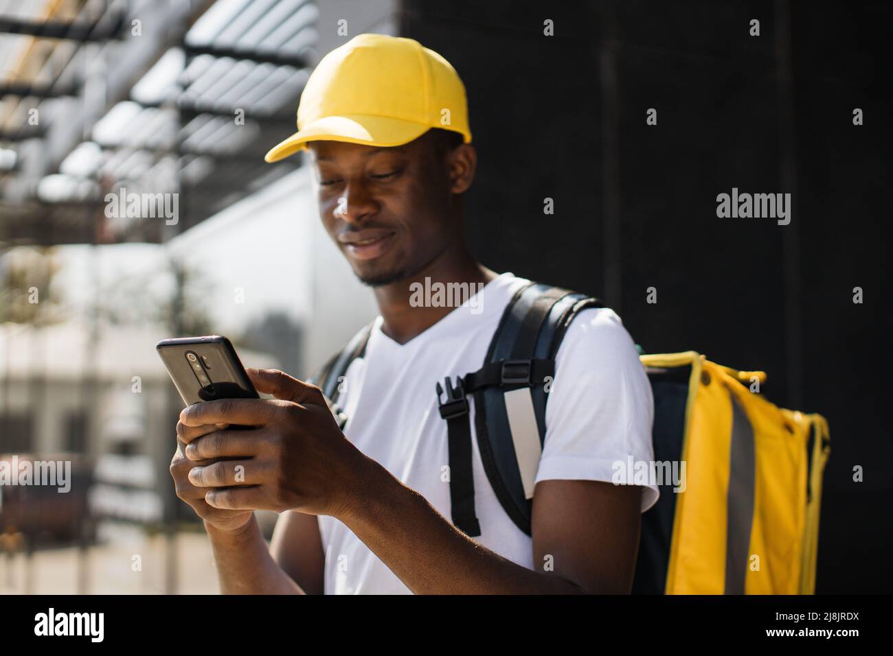 Restaurant delivery service african hi-res stock photography and images ...