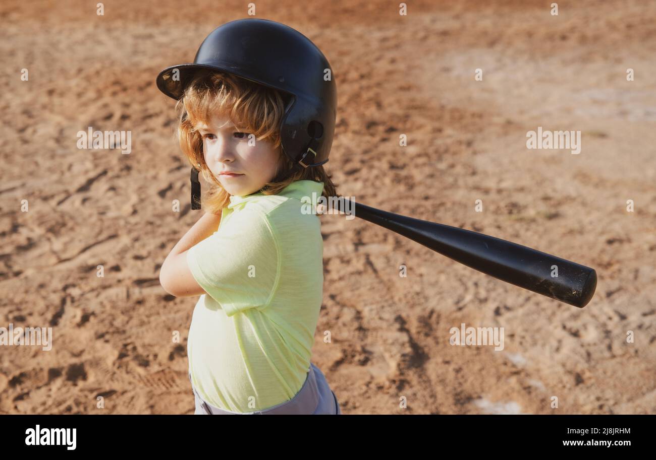 Baseball kid players in helmet and baseball bat in action Stock Photo ...
