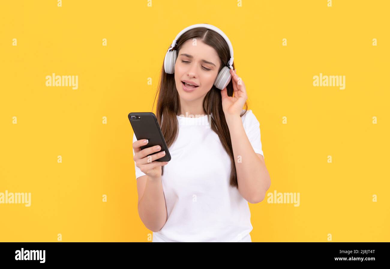Singing into phone hi-res stock photography and images - Alamy