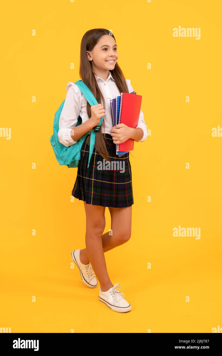 happy childhood. positive kid going to do homework. teenager student ...