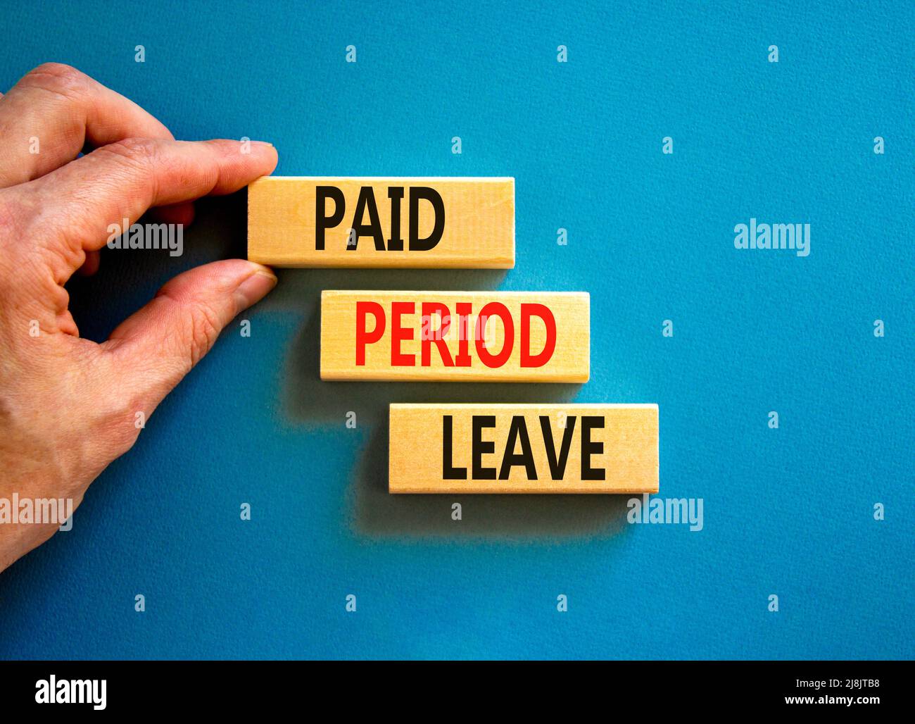 Paid period leave symbol. Concept words Paid period leave on wooden ...