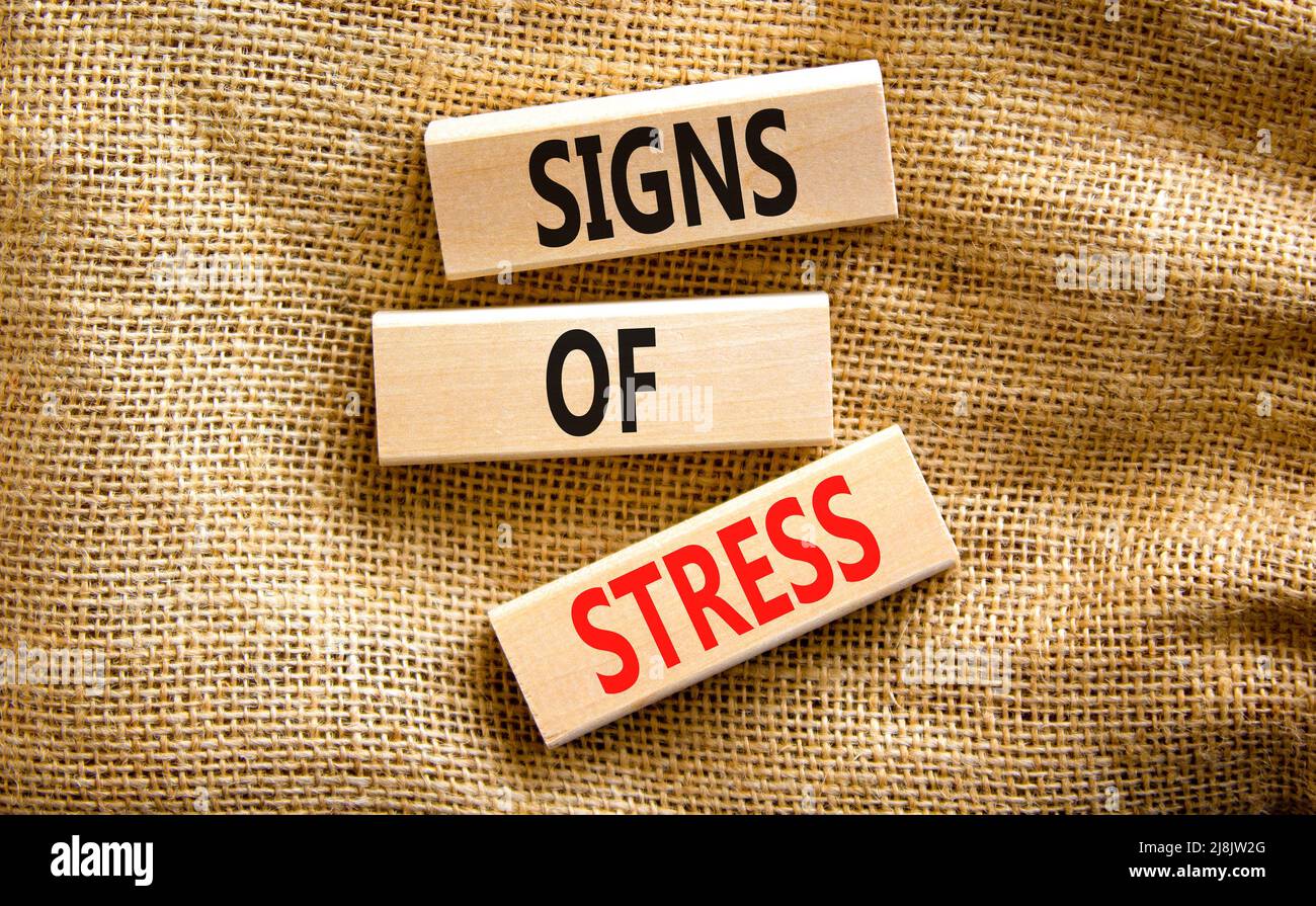 Signs of stress symbol. Concept words Signs of stress on wooden blocks ...