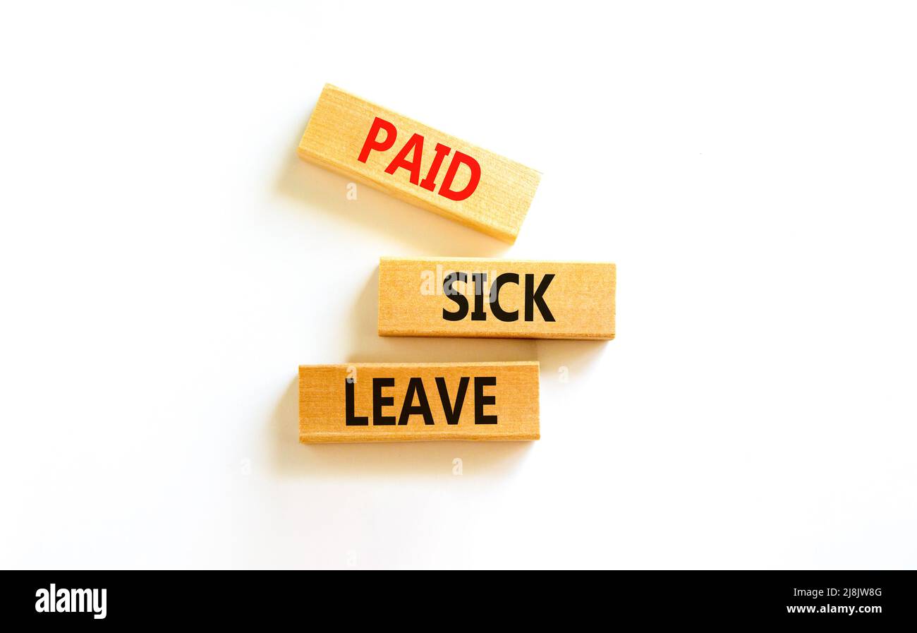 Paid sick leave symbol. Concept words Paid sick leave on wooden blocks ...