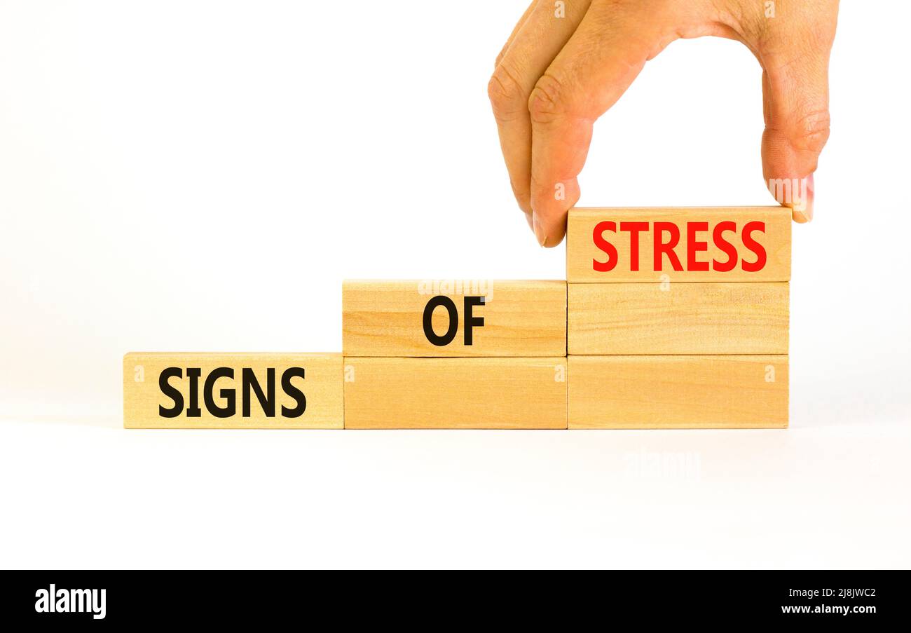 Signs of stress symbol. Concept words Signs of stress on wooden blocks ...