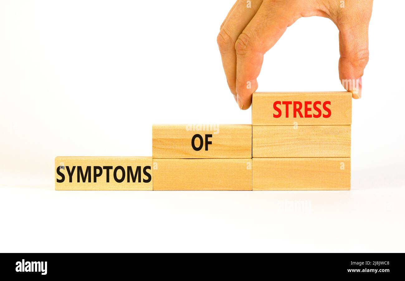 Symptoms of stress symbol. Concept words Symptoms of stress on wooden ...