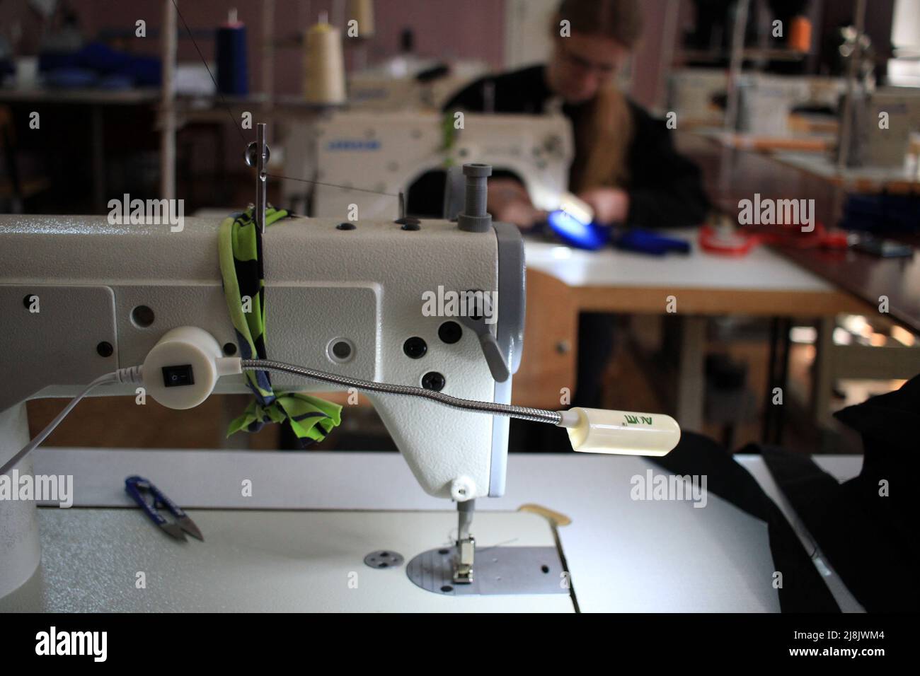 Odessa, Ukraine. 24th Mar, 2022. A close-up of a sewing machine against ...