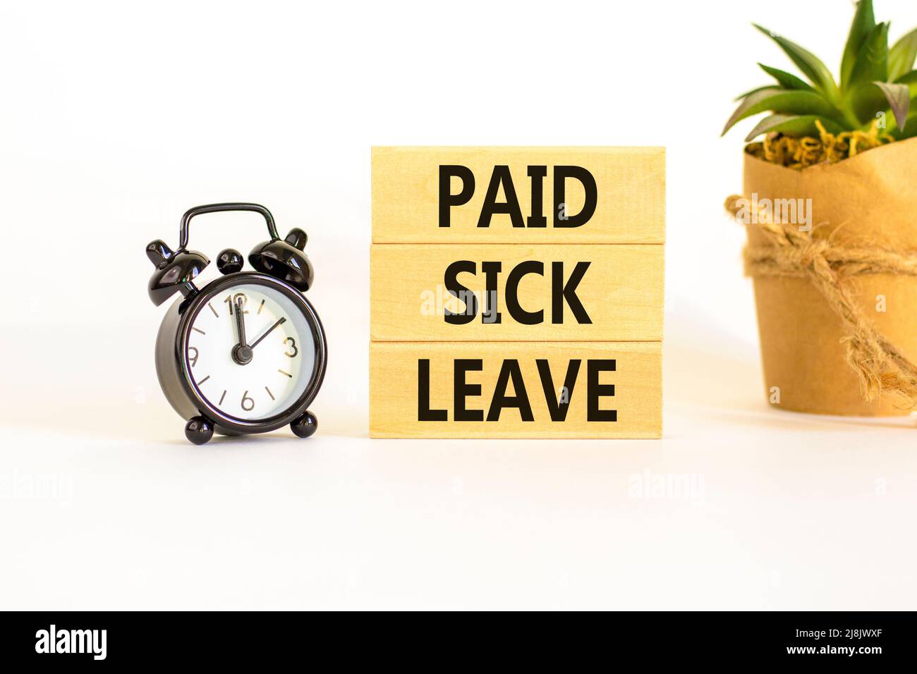 Paid sick leave symbol. Concept words Paid sick leave on wooden blocks ...