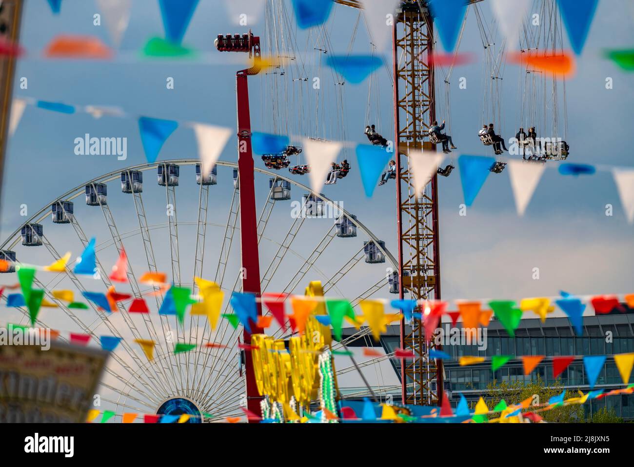 Rides, stalls, at the funfair, fair, spring fair, Easter fair, at the ...