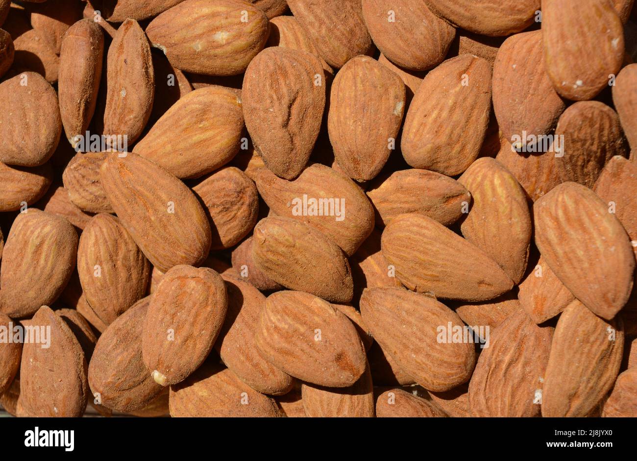 Organic, fresh almonds, flat lay, full frame background. Healthy food ...