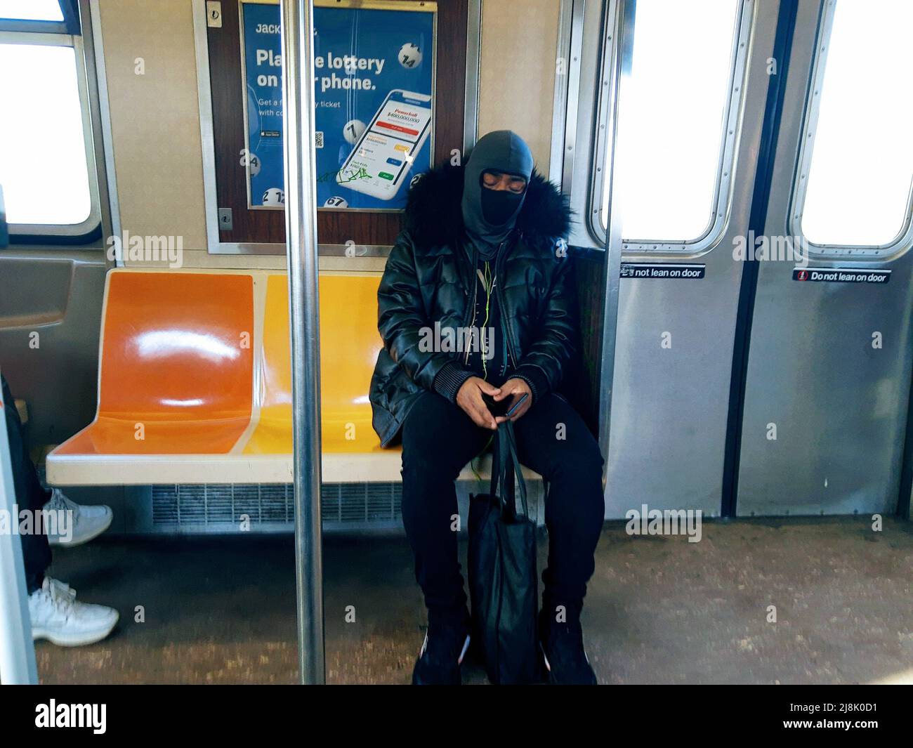 passengers on subway wearing masks due to COVID 19 pandemic Stock Photo ...