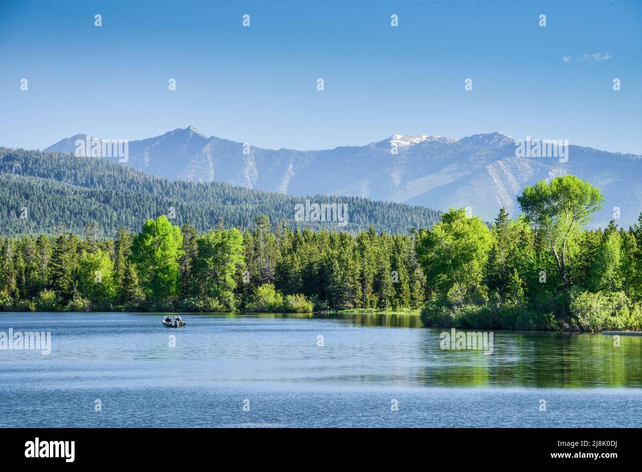 Scenic Island Park Reservoir with boat, Island Park, Fremont County ...