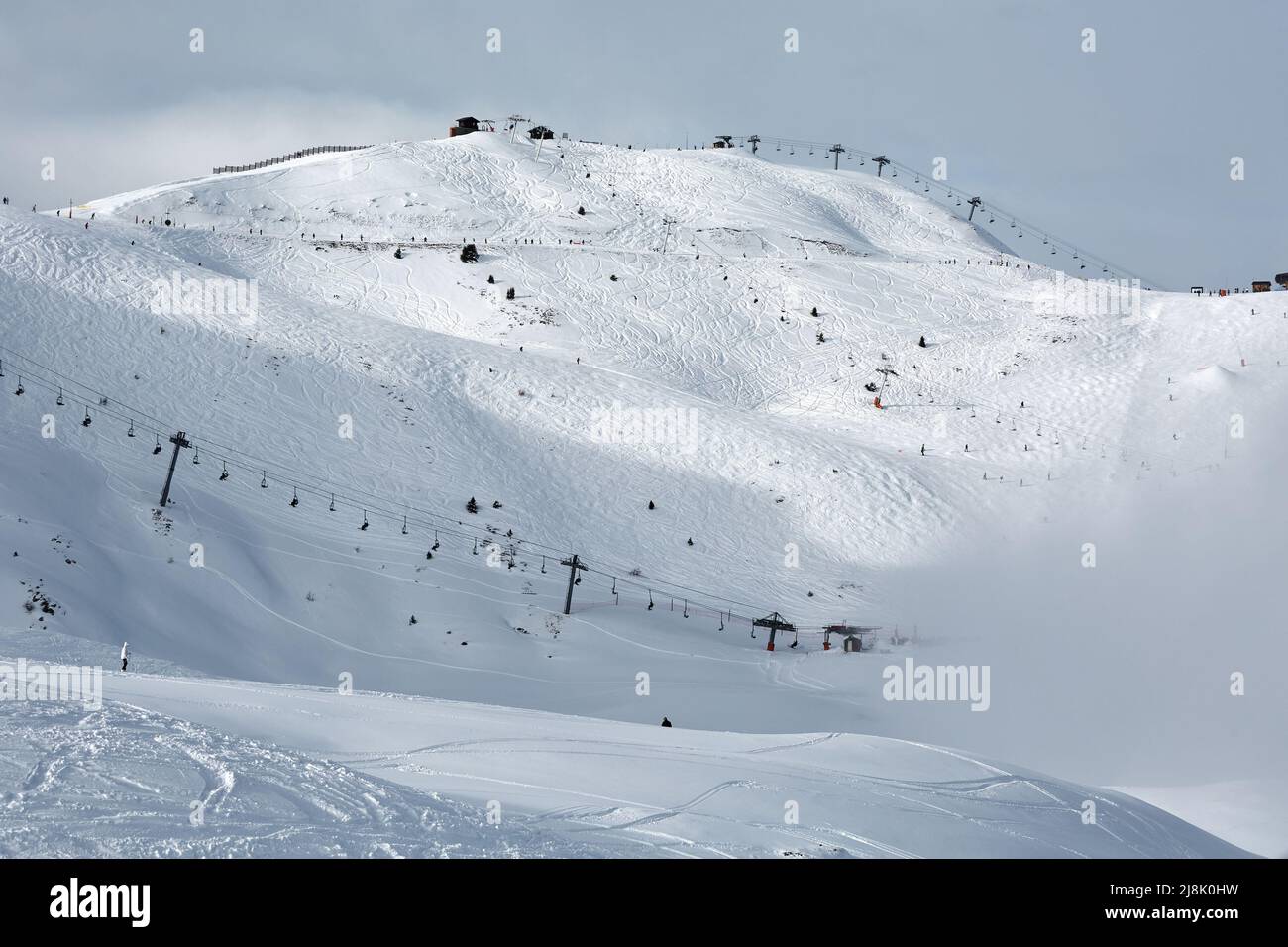 Skiing slopes, majestic Alpine landscape with snow and mountain range ...