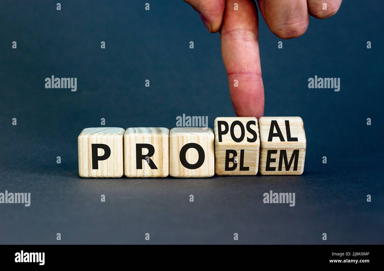 Solving a problem and making proposal symbol. Businessman turns wooden ...