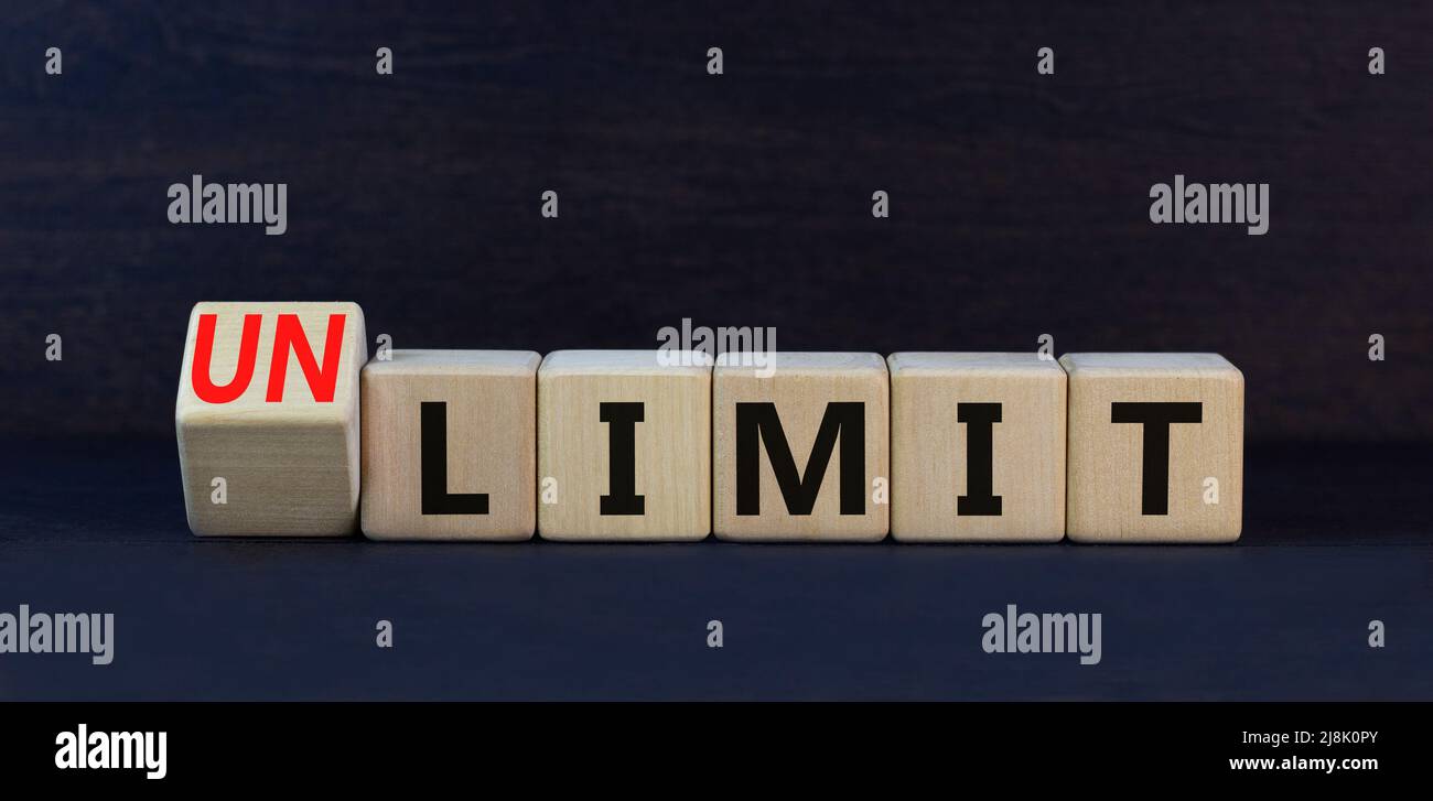 Limit or unlimit symbol. Turned wooden cubes and change the concept ...