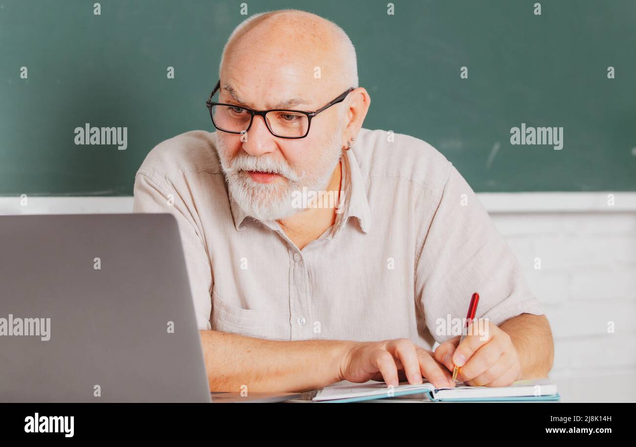 Elderly Education And Retired Knowledge Concept Senior Teacher