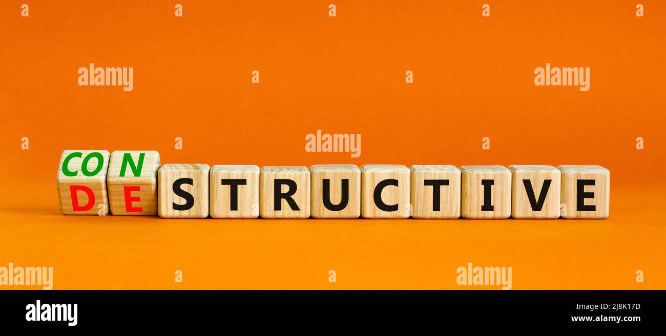 Destructive or constructive symbol. Turned wooden cubes and changed the ...