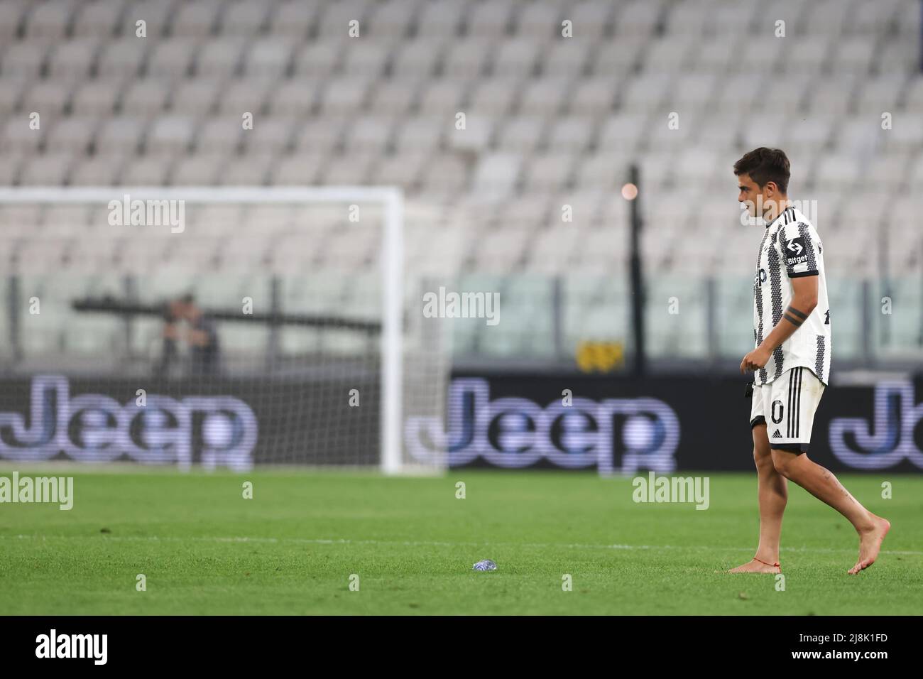 Turin, Italy. 16th May, 2022. Paulo Dybala of Juventus walks barefoot ...