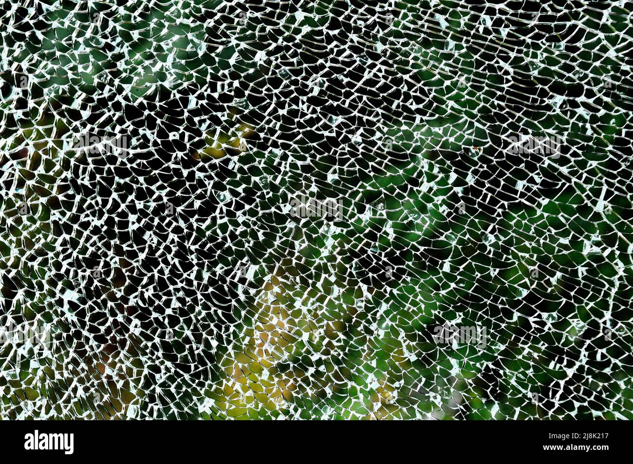 broken safety glass pane Stock Photo - Alamy