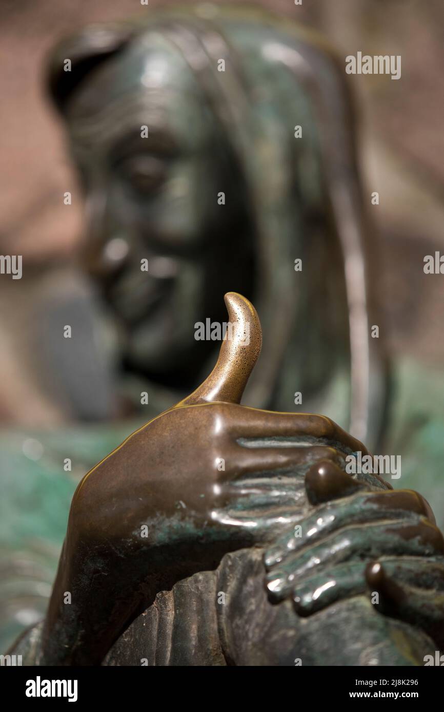 Scuffed thumb of the sculpture Till Eulenspiegel on the fountain in the ...