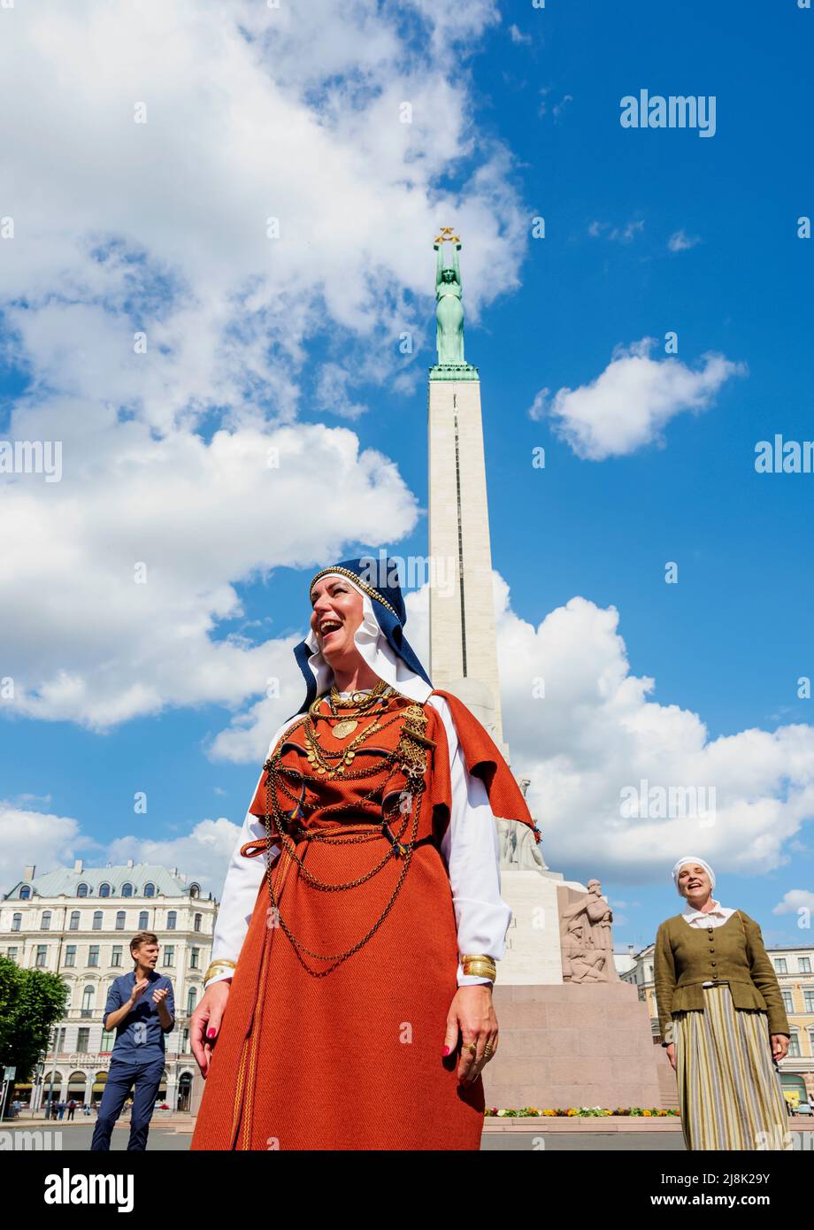 People in traditional clothing, Freedom Square, Riga, Latvia Stock ...