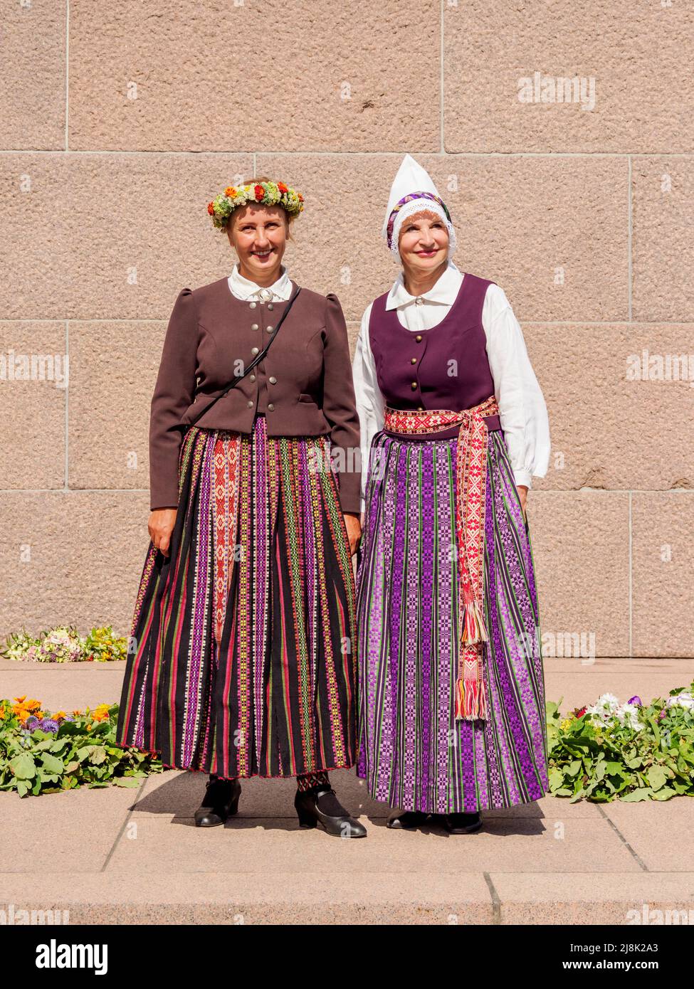 People in traditional clothing, Freedom Square, Riga, Latvia Stock ...