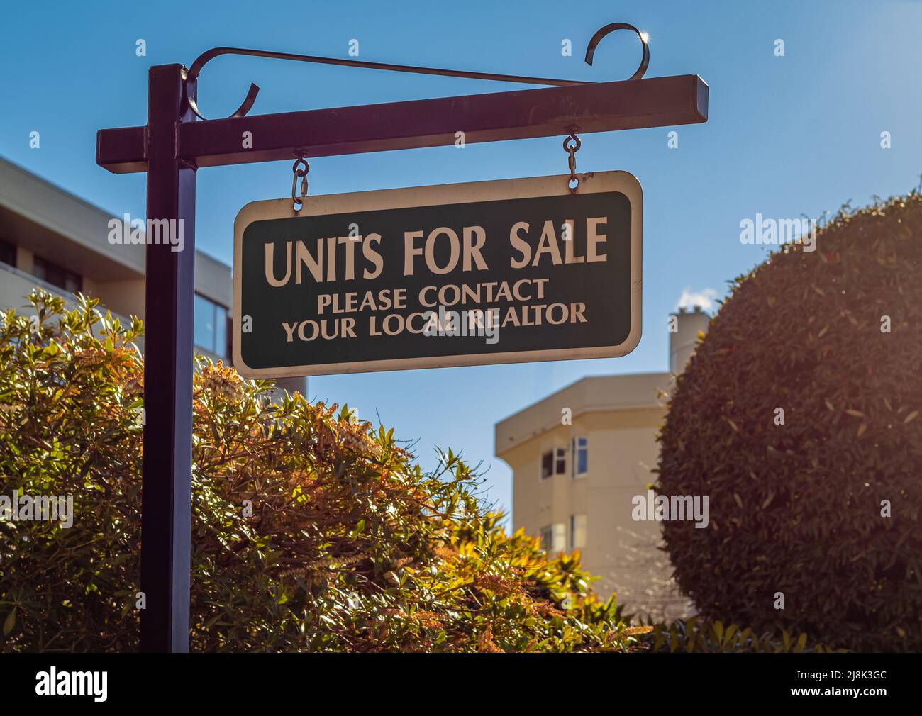 For Sale signs displayed outside of a new houses. Estate agent sign ...