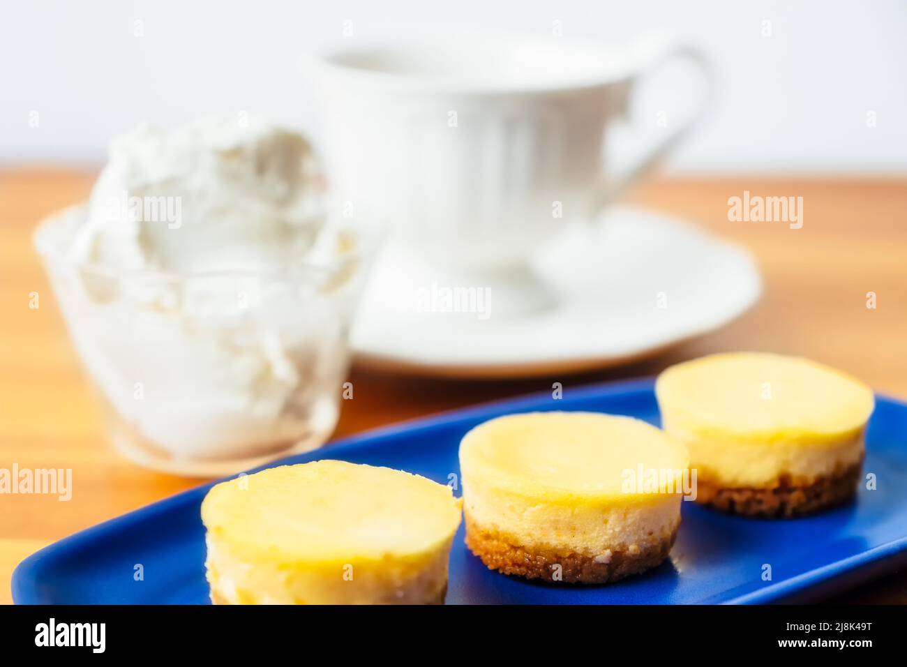 Small round homemade cheesecakes served with tea for a snack Stock ...