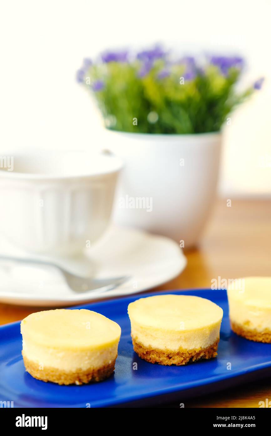 Small round homemade cheesecakes served with tea for a snack Stock ...