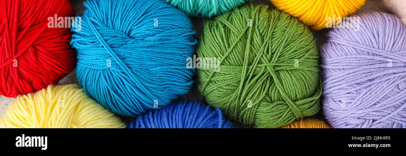 Balls of colorful knitting yarns as background. Banner for design Stock ...