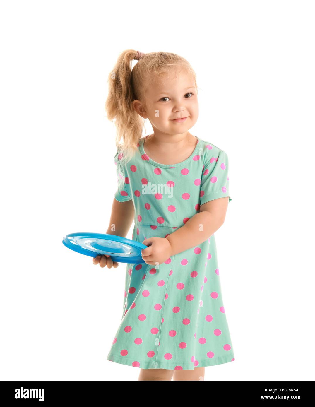 Cute little girl playing frisbee on white background Stock Photo - Alamy