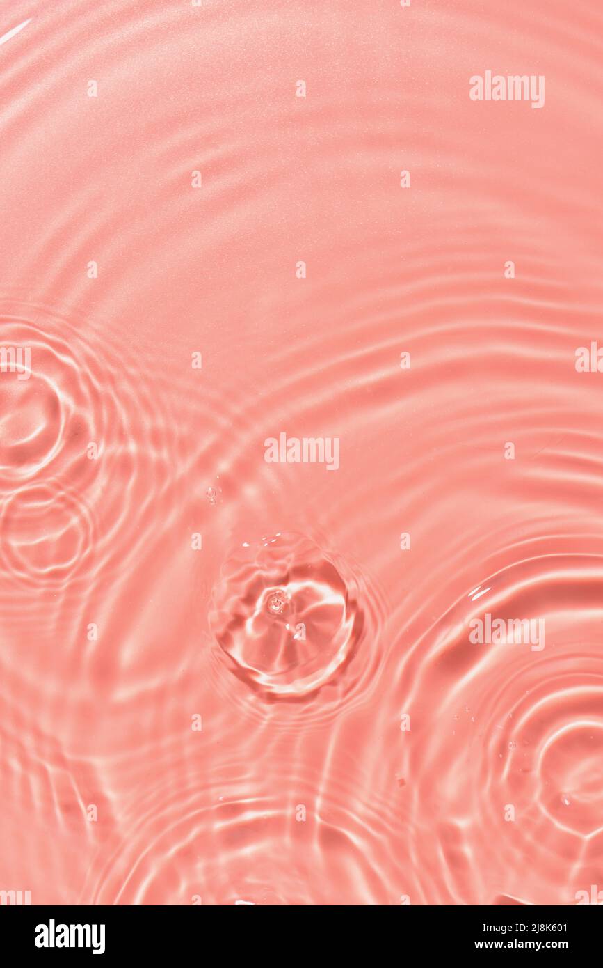 Texture of water with ripples on pink background, closeup Stock Photo ...