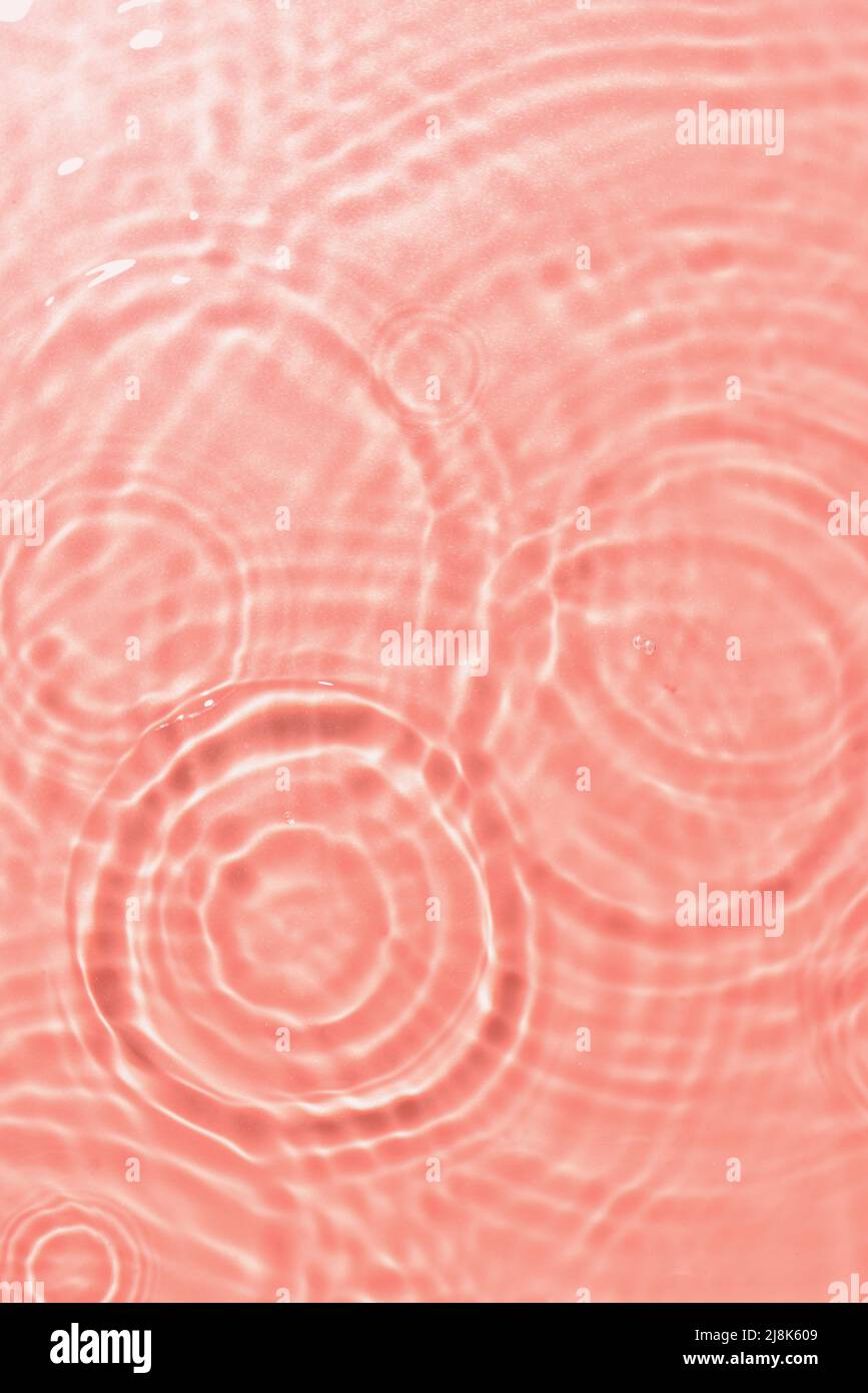 Texture of water with ripples on pink background, closeup Stock Photo ...