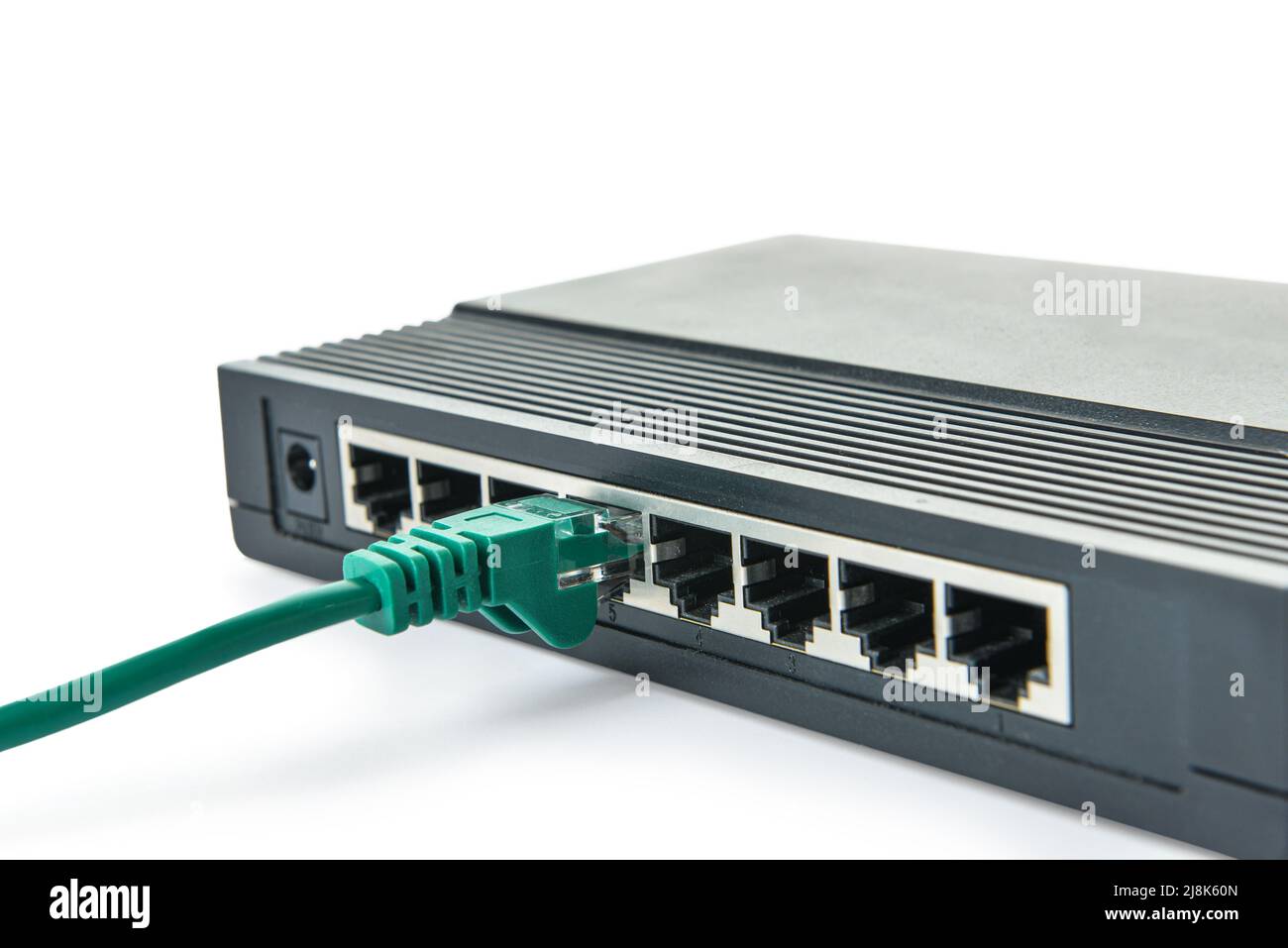 Modern wi-fi router and internet cable isolated on white background ...